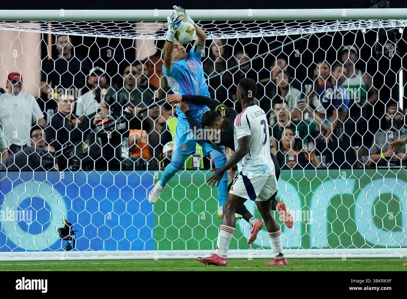 Costa Rica goalkeeper Keylor Navas grabs the ball out of the air ...