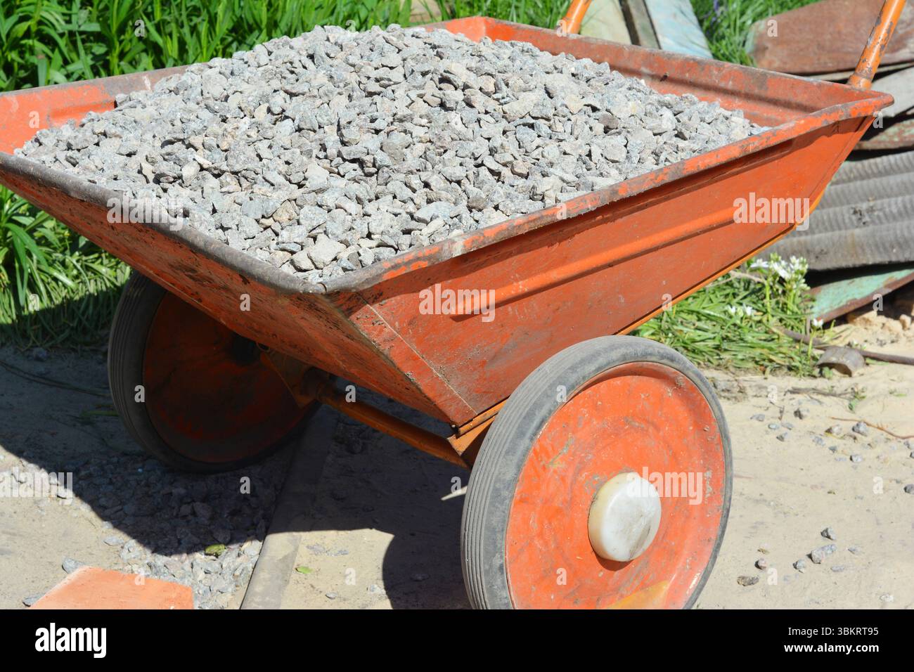Construction wheel barrow pile hi-res stock photography and images - Alamy