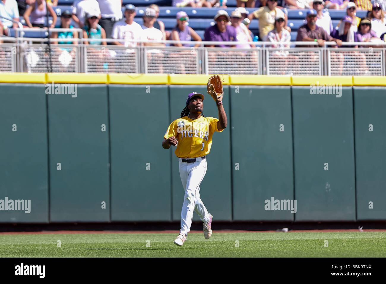 Omaha, NE, USA. 22nd June, 2025. LSU's Chris Stanfield (1) catches a ...