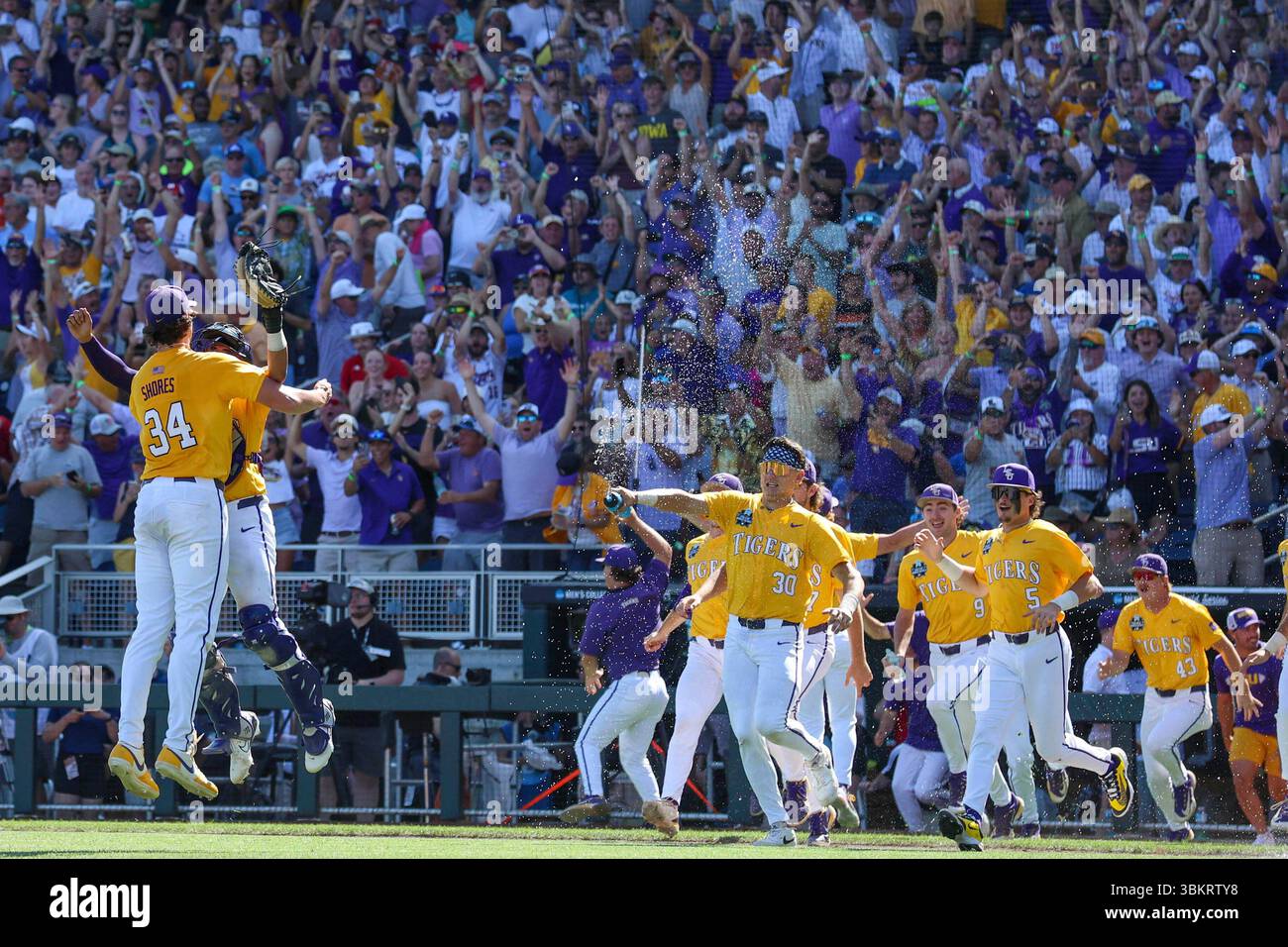 June 22, 2025: LSU relief pitcher Chase Shores (34) and catcher Luis ...