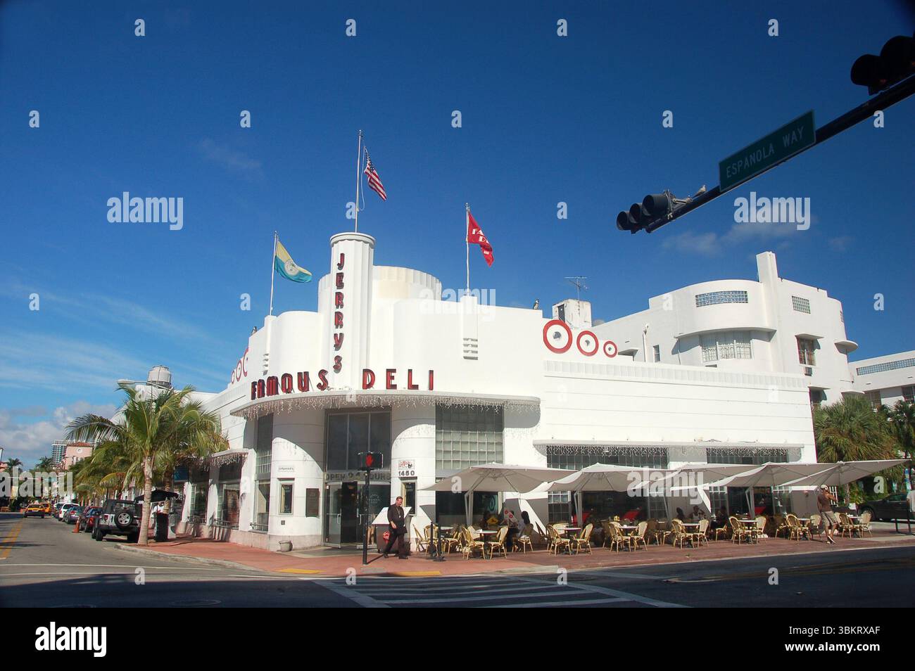 Busy street in Miami Beach, Florida, with Art Deco buildings, palm ...
