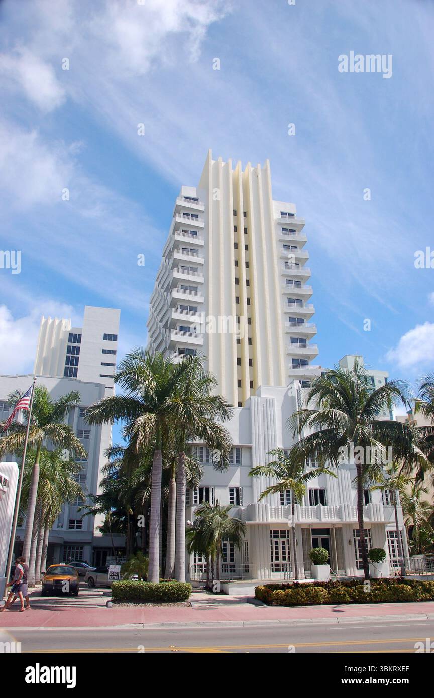 Busy street in Miami Beach, Florida, with Art Deco buildings, palm ...