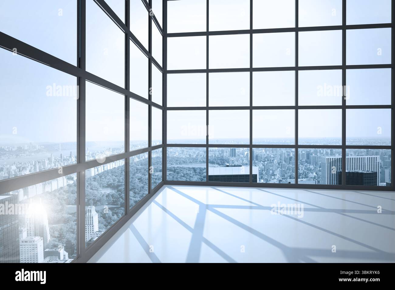 Room with large windows showing city Stock Photo - Alamy