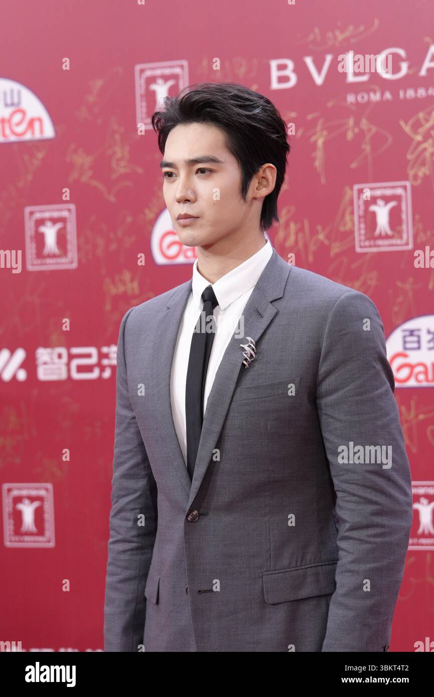 Chinese actor and model Yu Shi poses for a photo on the red carpet at ...