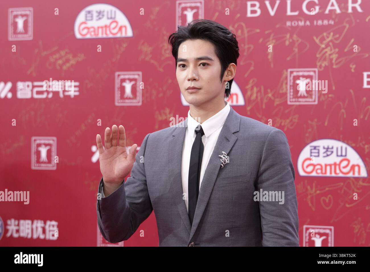 Chinese actor and model Yu Shi poses for a photo on the red carpet at ...