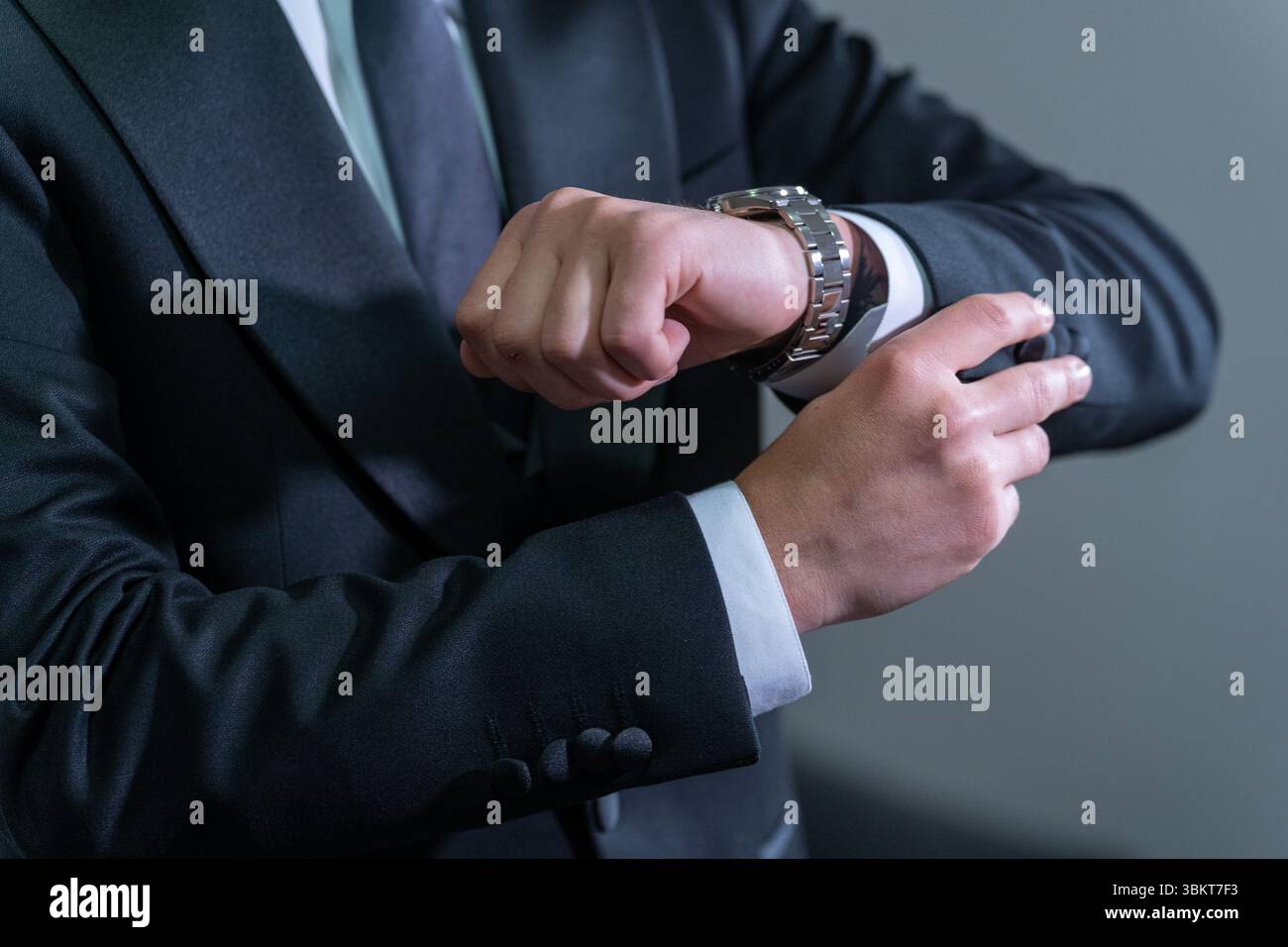 Groom’s Hands Checking Watch – Close-Up Wedding Detail Stock Photo - Alamy