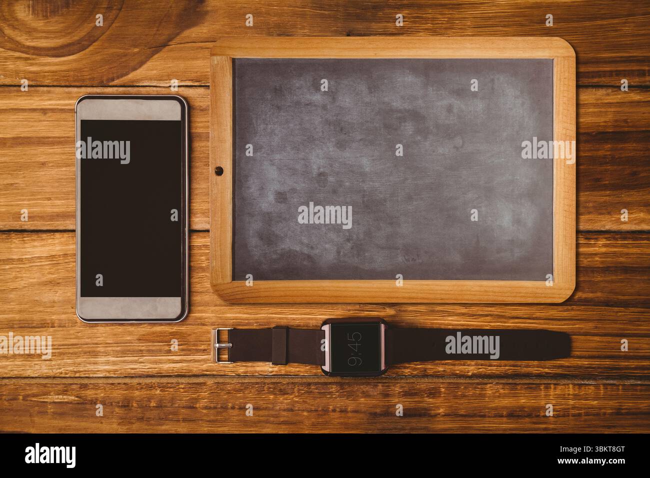 Flat design is showing top-down smartphone, chalkboard, smartwatch ...