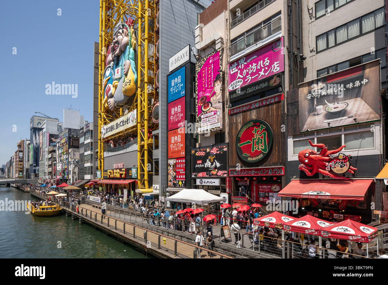 Dotonbori is a principal tourist destination in Osaka, running along ...
