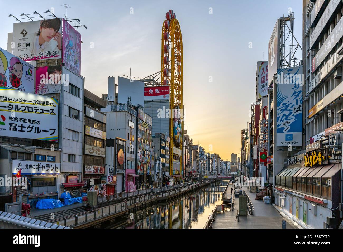 Dotonbori is a principal tourist destination in Osaka, running along ...