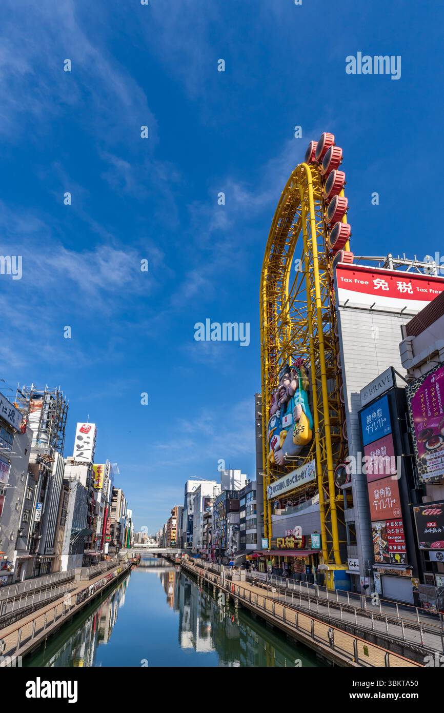 Dotonbori is a principal tourist destination in Osaka, running along ...