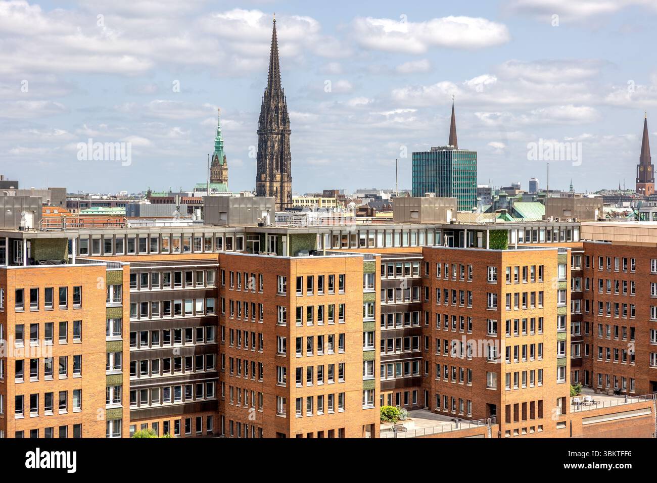 City skyline. Architectural spires. Brick development Stock Photo - Alamy