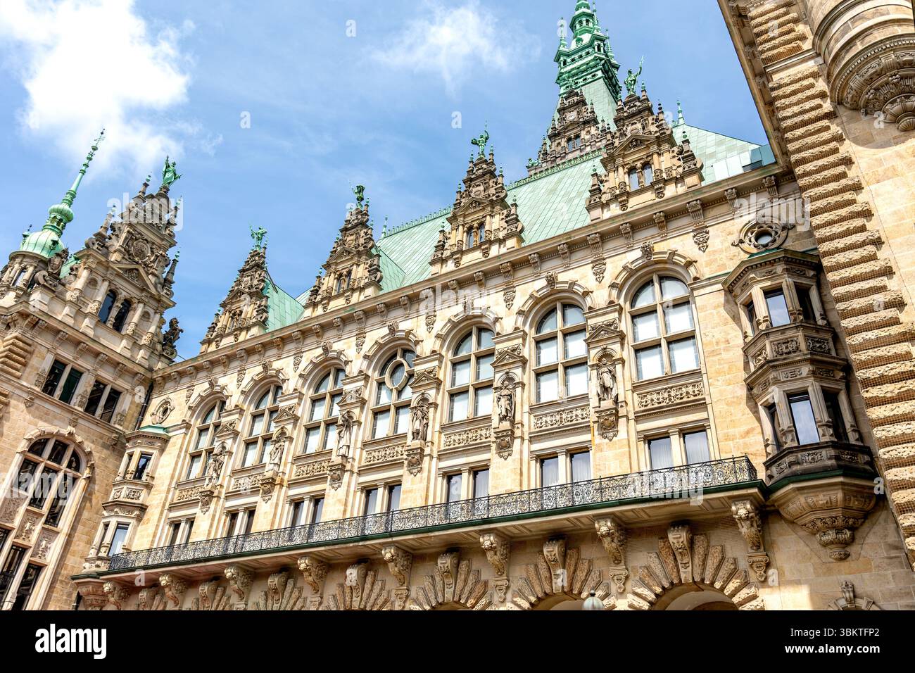 Historic European architecture. Ornate facade. Green spires Stock Photo ...