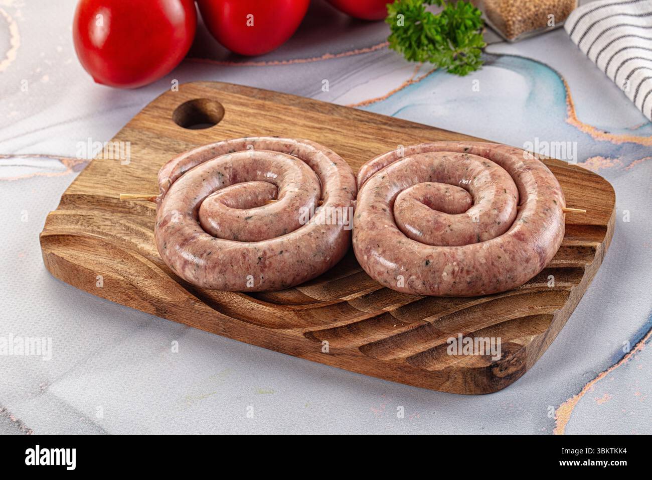 Raw meat pork and beef swirl sausages for grill Stock Photo - Alamy