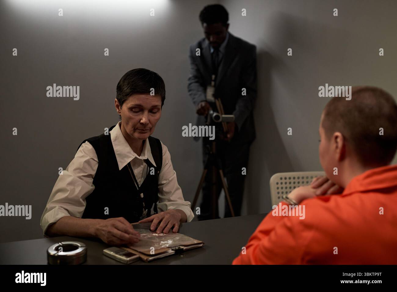 Middle aged Caucasian woman interrogating young adult Caucasian woman ...
