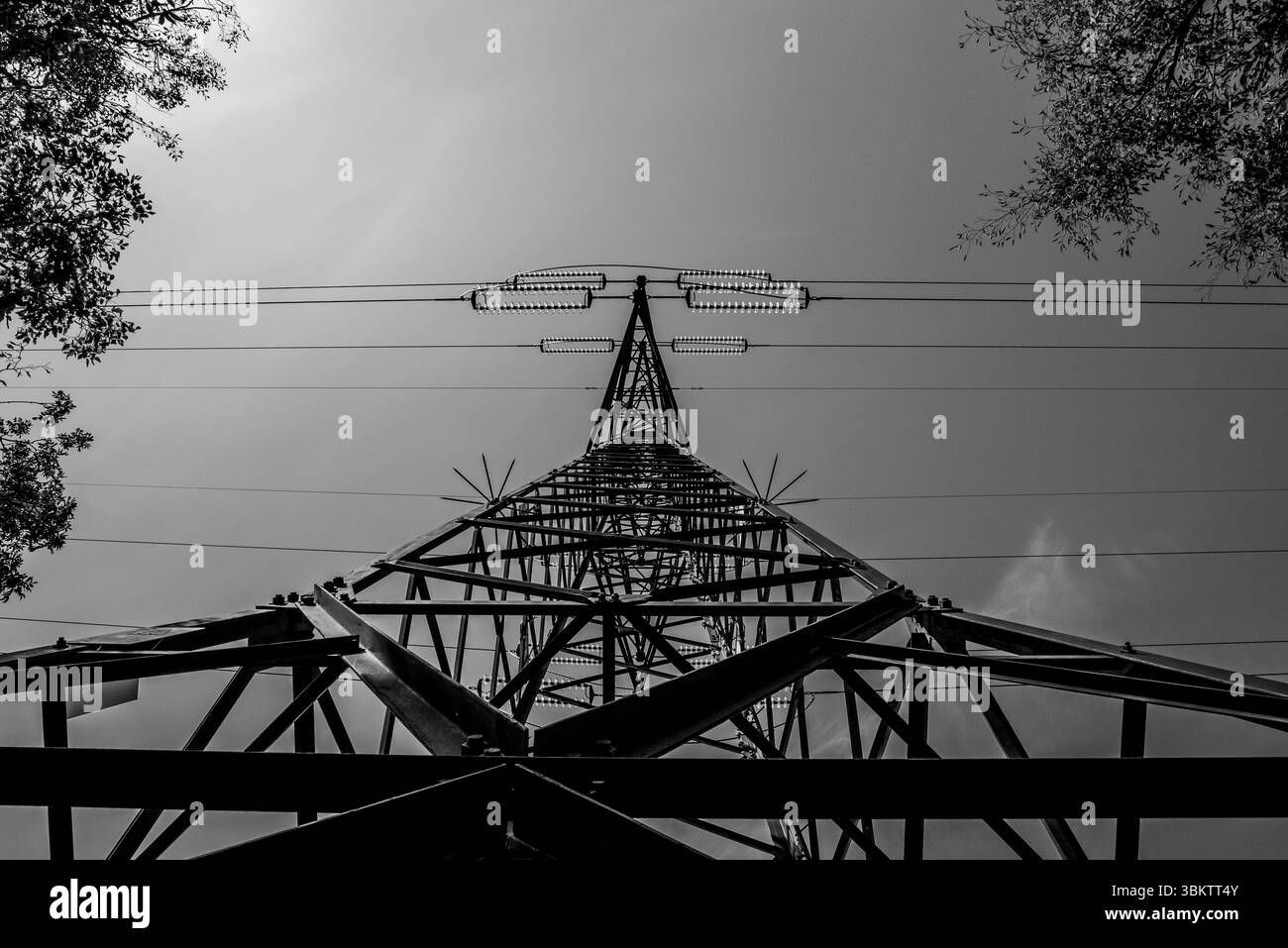 steel beams make up the intricate geometries of a high voltage pylon ...
