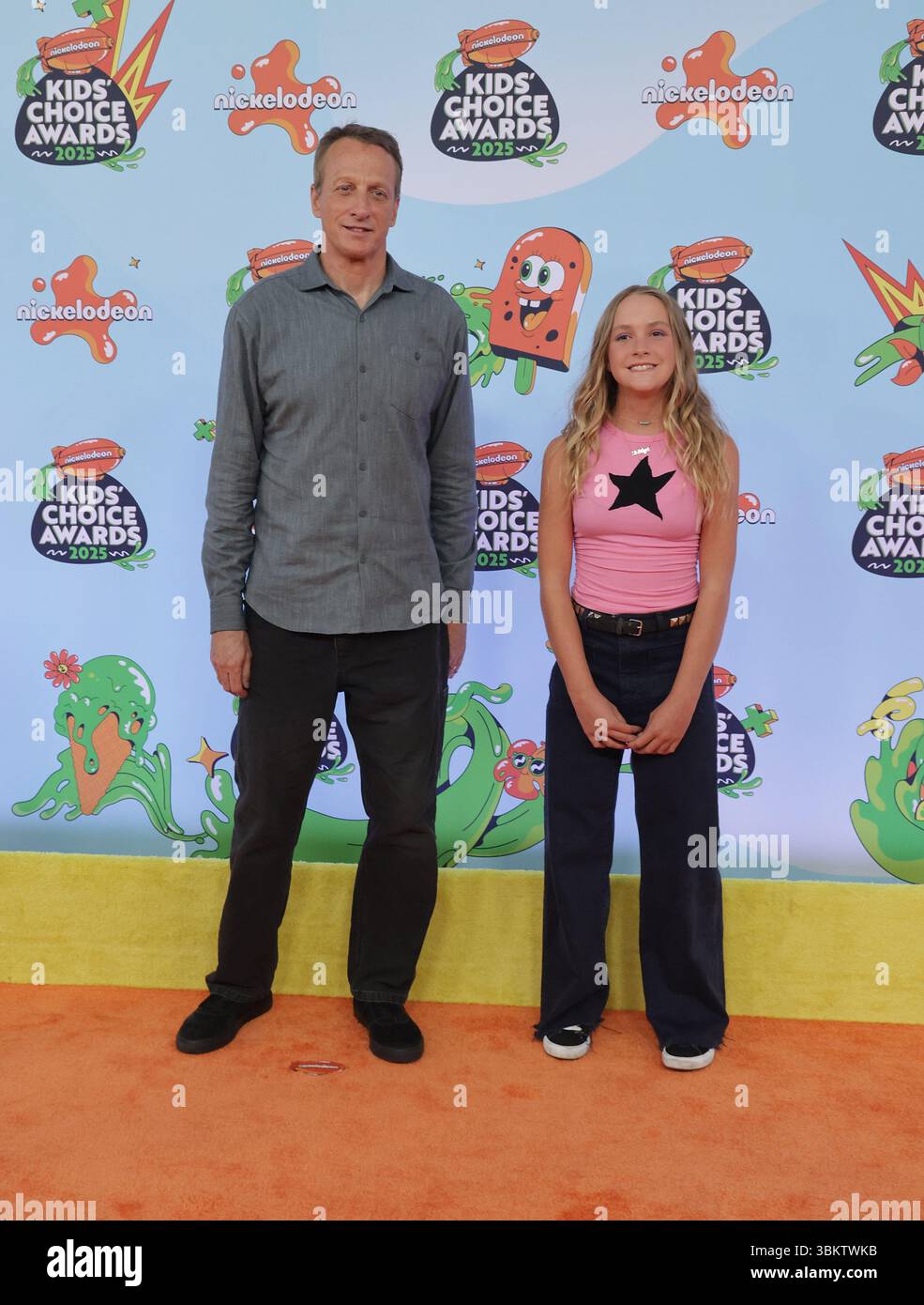 Tony Hawk and Katelyn West attends the 2025 Nickelodeon Kids' Choice ...