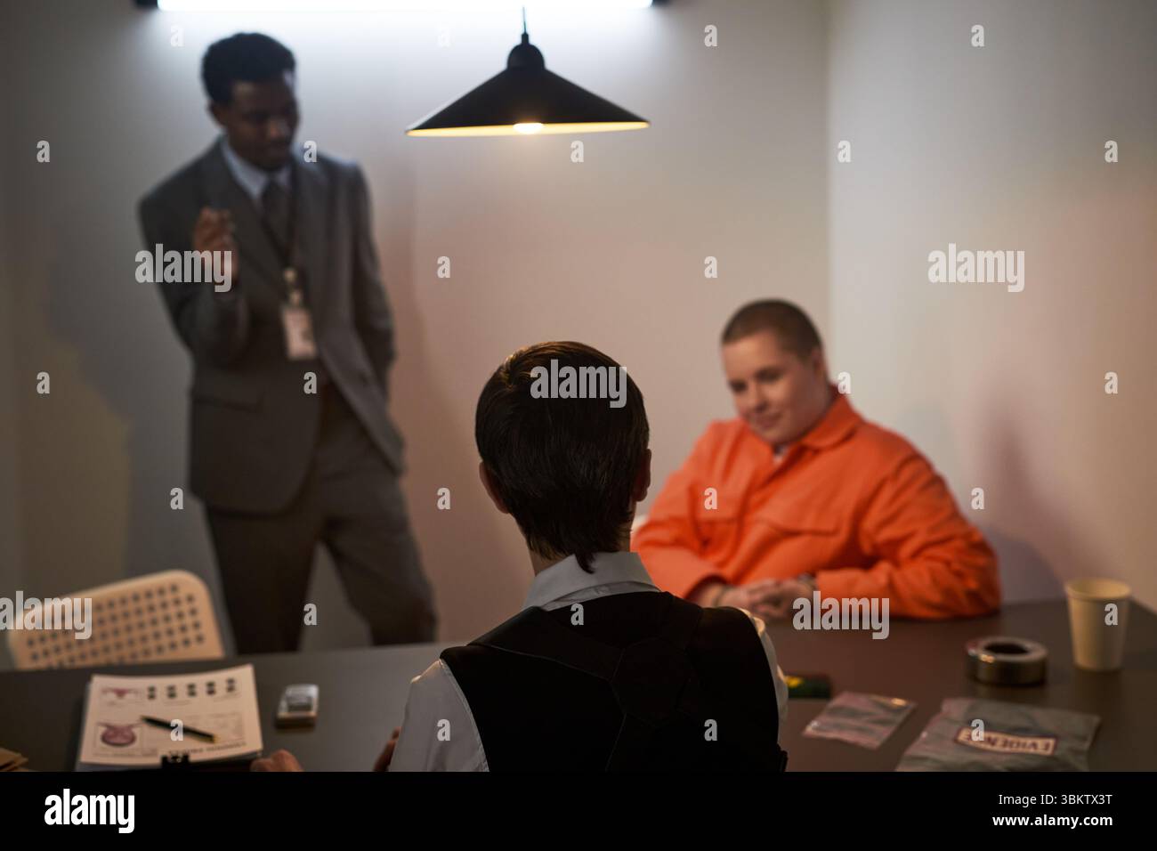 Female prisoner wearing prison uniform hi-res stock photography and ...