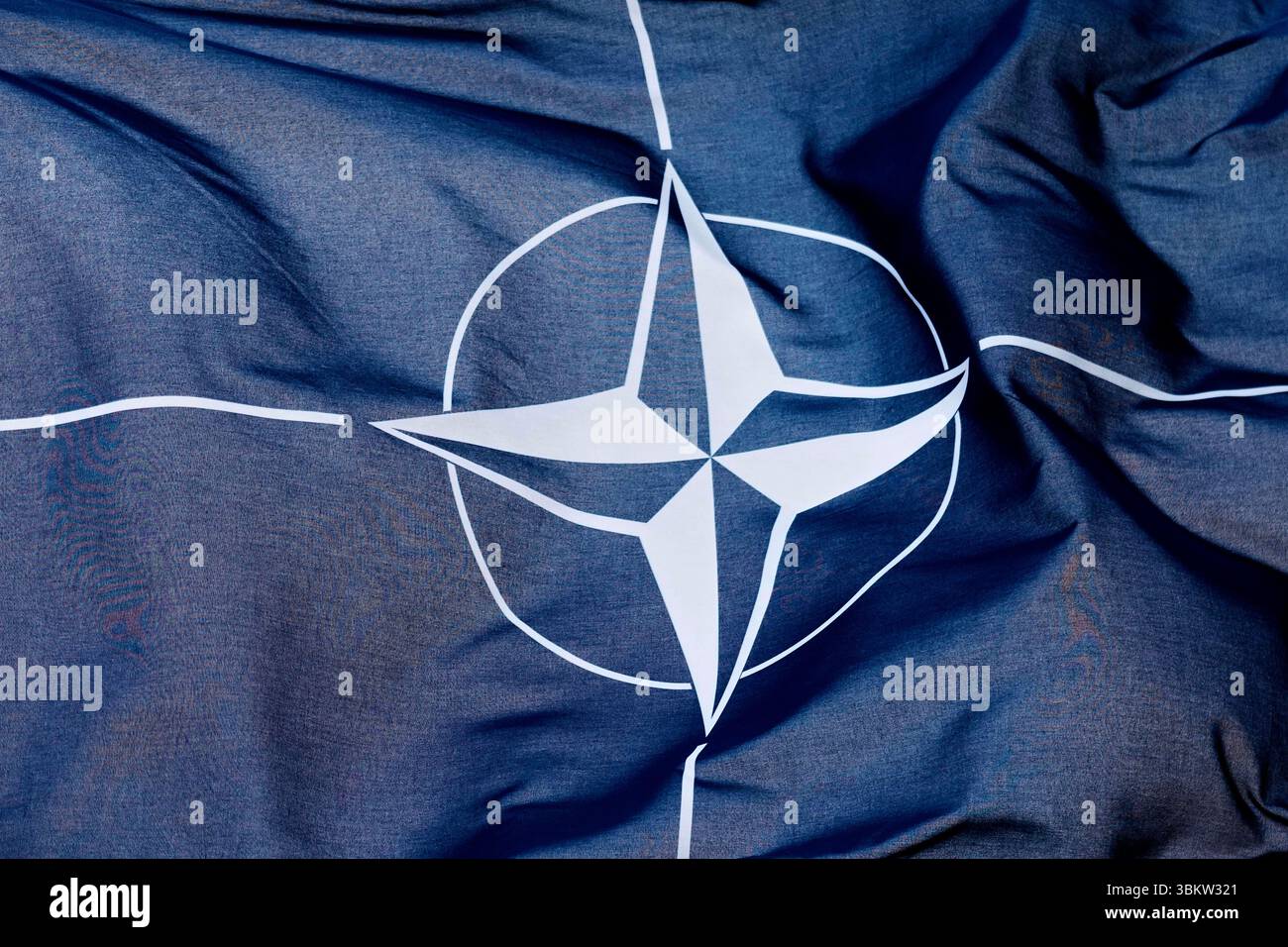 The NATO flag waves in the wind in front of the venue ahead of the ...