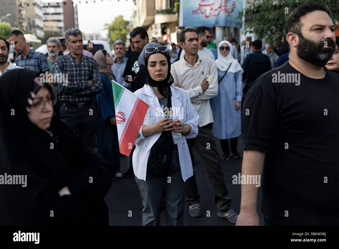 Tehran, Tehran, Iran. 22nd June, 2025. a woman protestor holds an ...