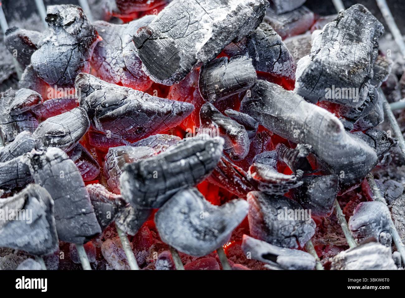 burning red coals in charcoal grill Stock Photo - Alamy