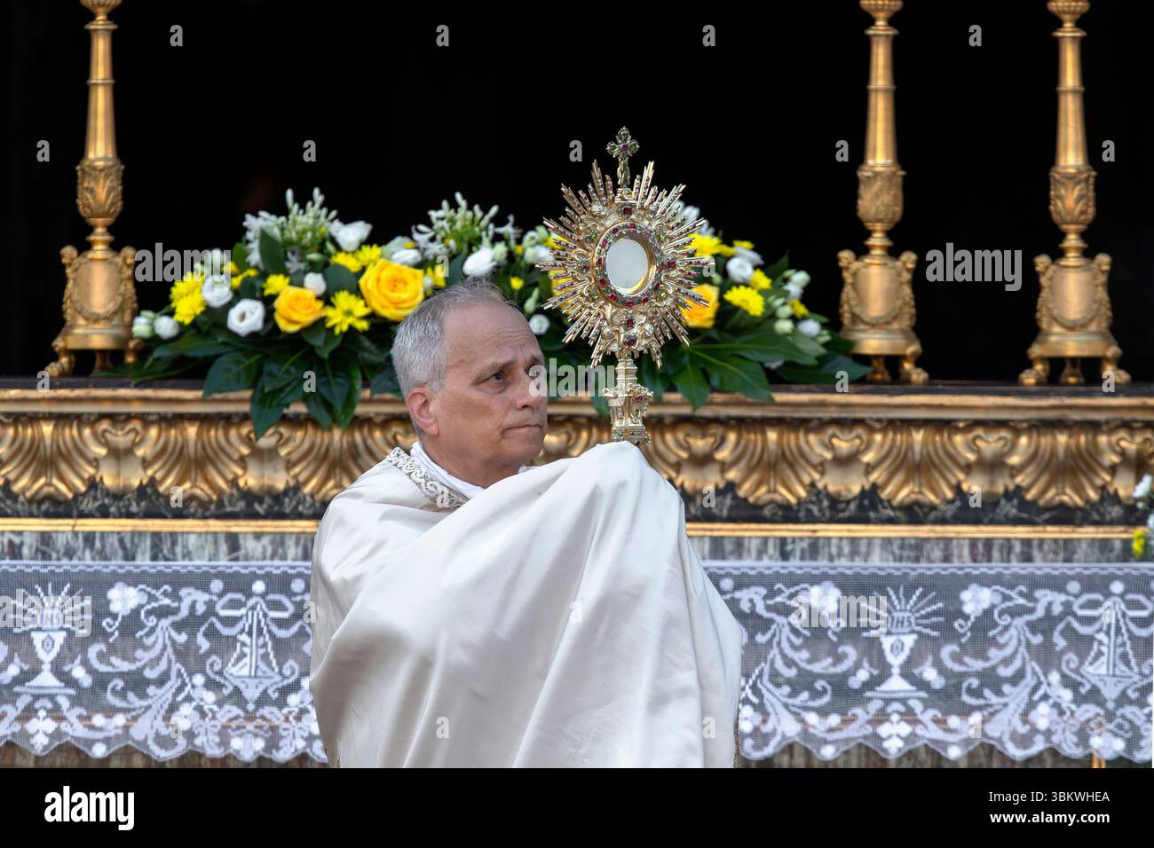 Pope Leo XIV holds up the monstrance in front of St. Mary Major ...