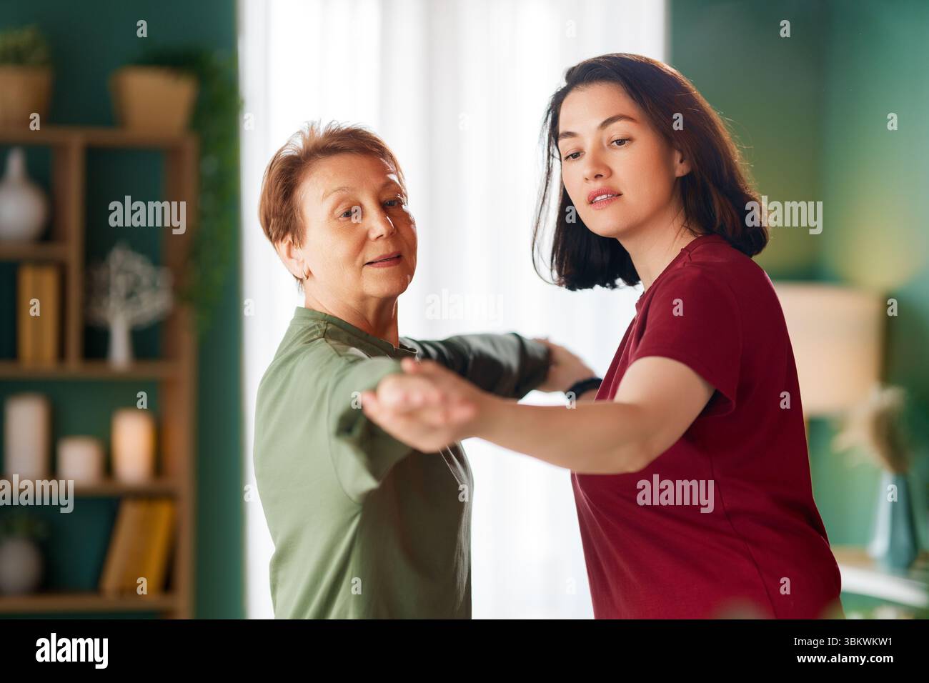 Muscle rehabilitation therapy nurse helping hi-res stock photography ...
