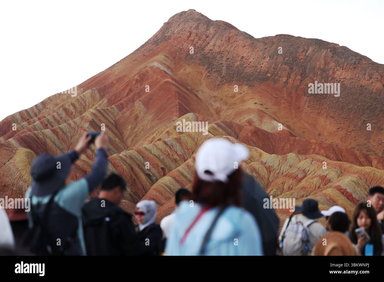 Zhangye, China's Gansu Province. 22nd June, 2025. Tourists enjoy the ...