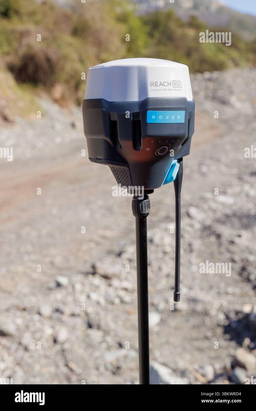 Reach RS2 RTK GNSS Rover collecting precise location data in the field ...