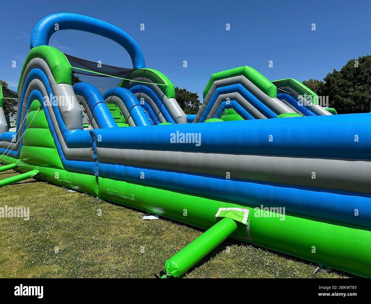 Inflated air castle at the playground Stock Photo - Alamy