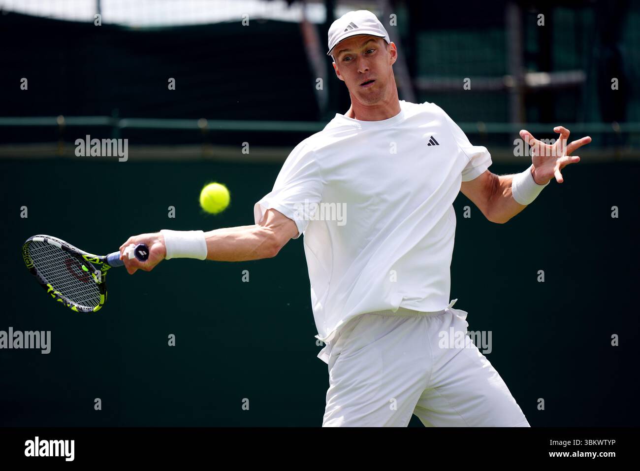 Jan Choinski in action against Mark Lajal, during Wimbledon qualifying ...