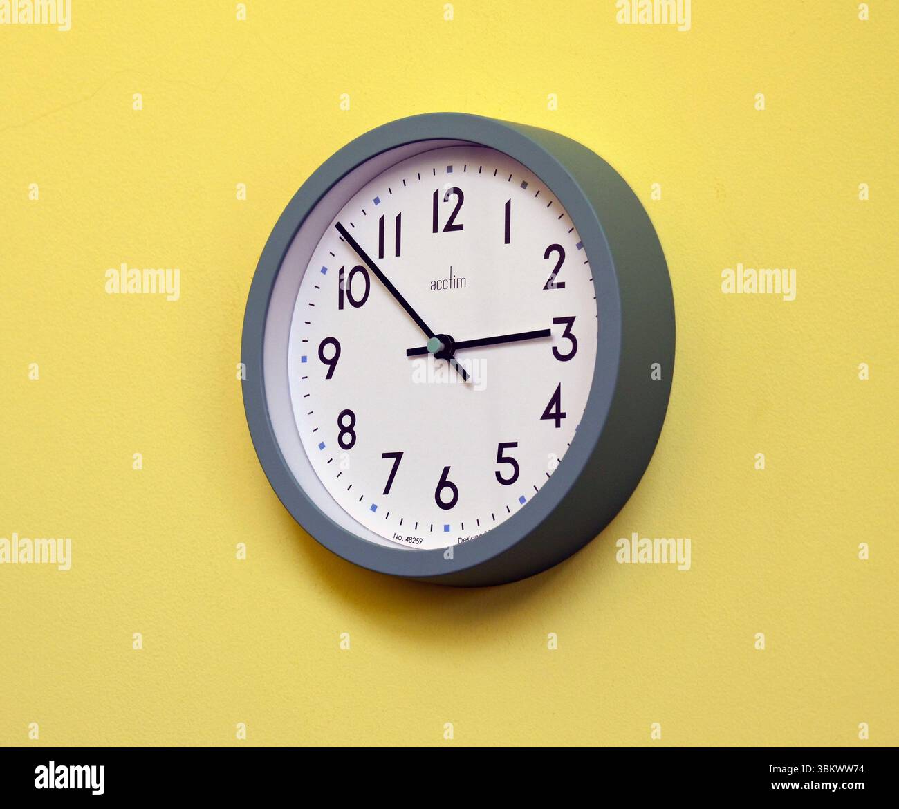 Acctim electronic, battery operated, wall clock, with Arabic numerals ...