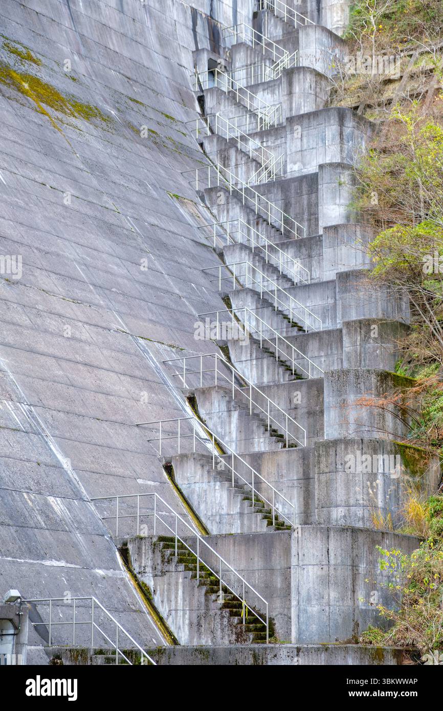 Maintenance stairs on a concrete dam face Stock Photo - Alamy