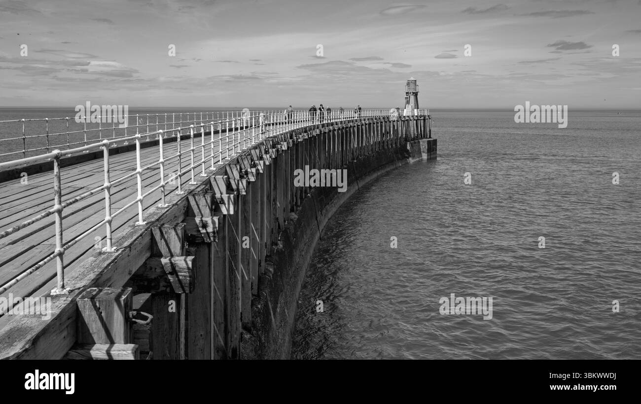 Whitby Harbour Pier and Light, Whitby, North Yorkshire, UK Stock Photo ...