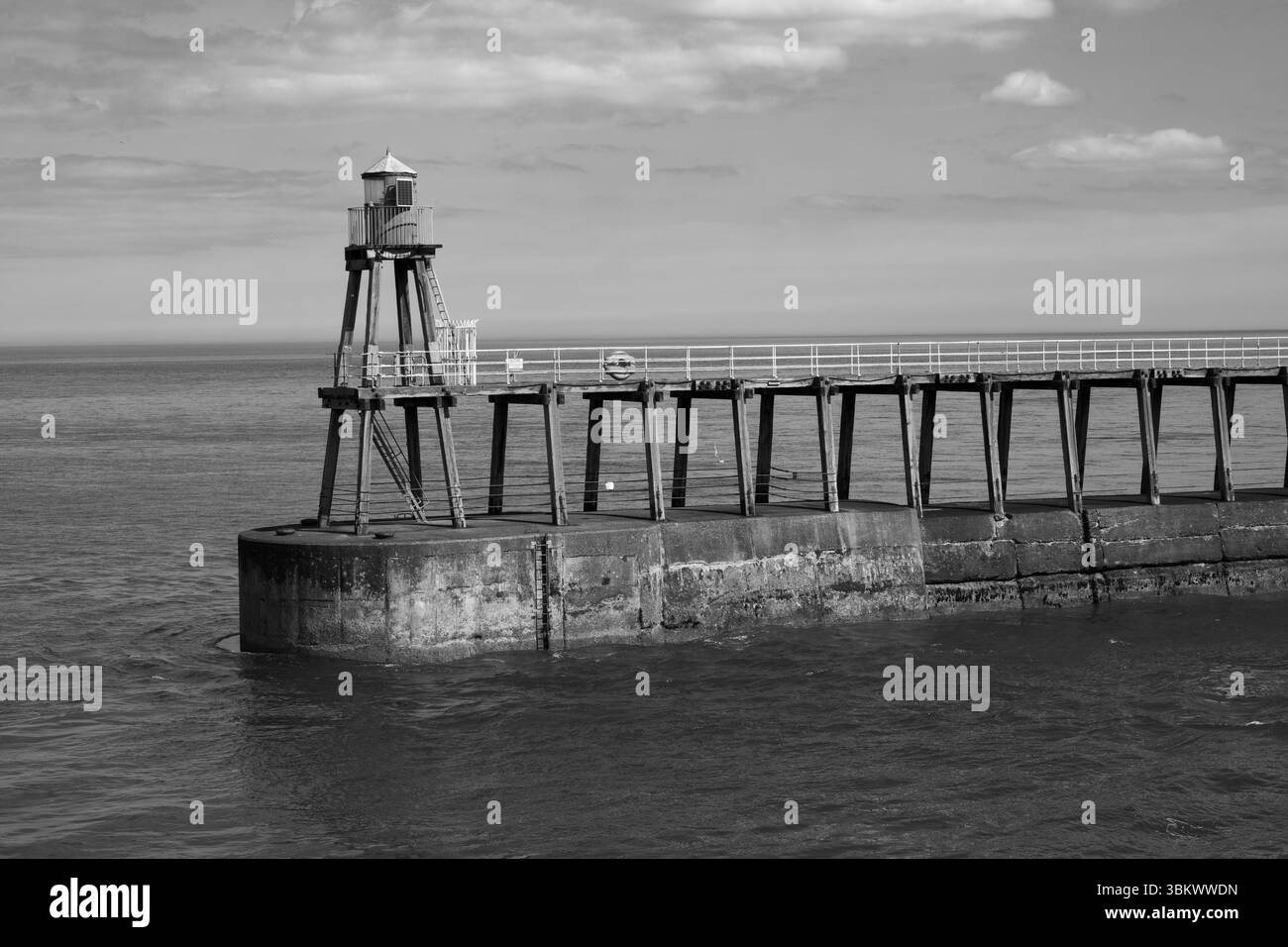 Whitby Harbour Pier and Light, Whitby, North Yorkshire, UK Stock Photo ...