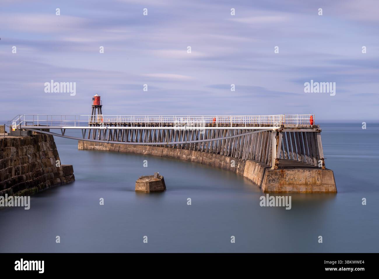Whitby Harbour Pier and Light, Whitby, North Yorkshire, UK Stock Photo ...