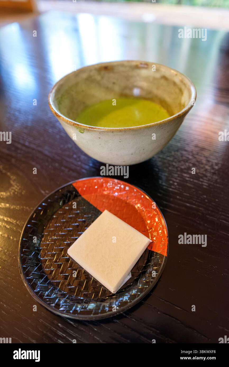Enjoying traditional Japanese matcha tea and wagashi Stock Photo - Alamy