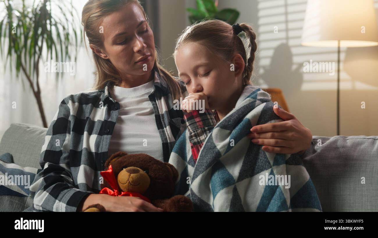 Sick mother hugging children hi-res stock photography and images - Alamy