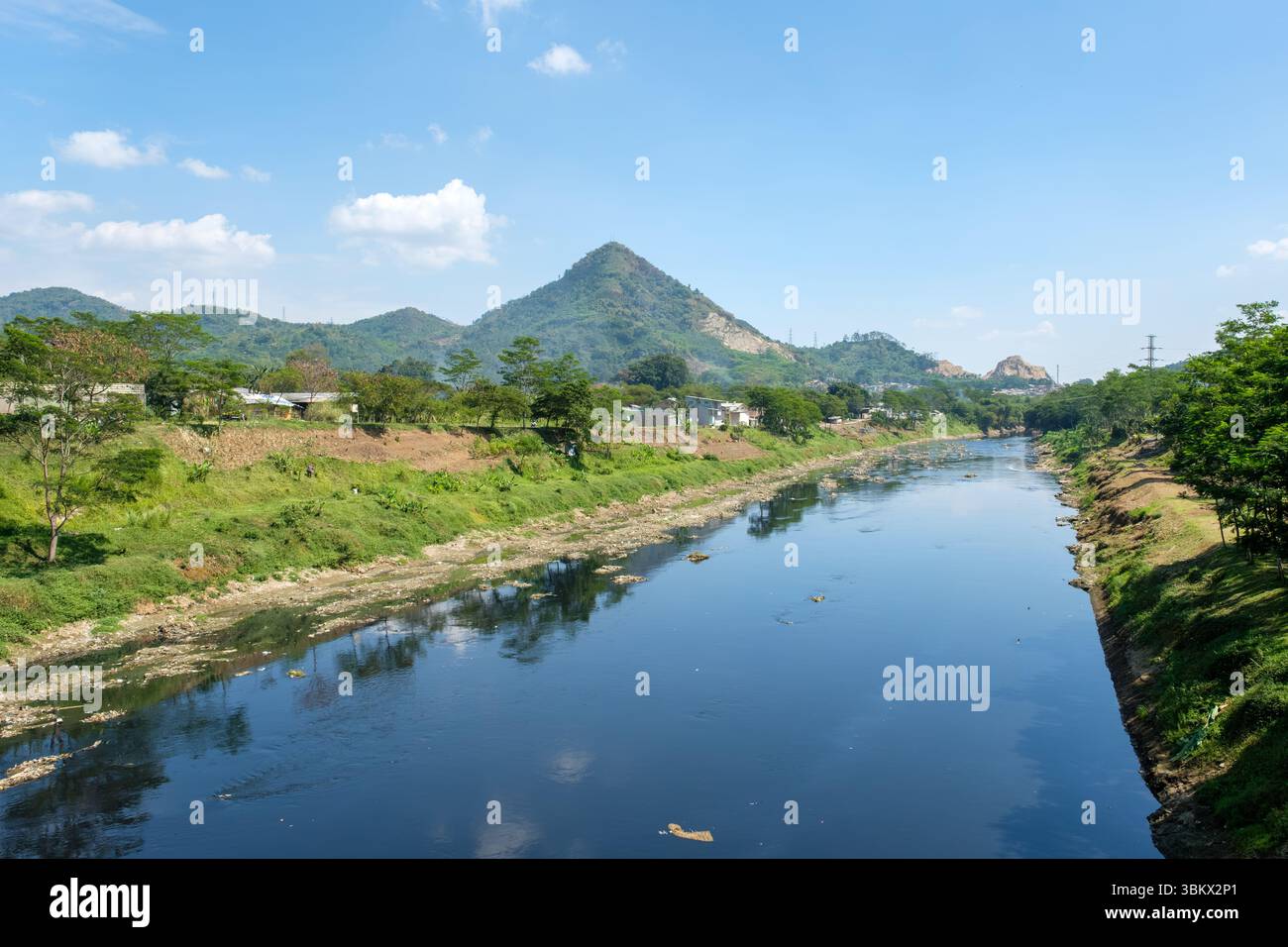 Citarum River, Java, downstream of Bandung. The polluted river flows ...