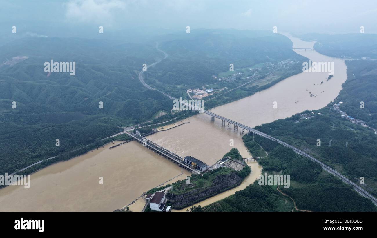 LIUZHOU, CHINA - JUNE 23, 2025 - The flood flowed through the section ...