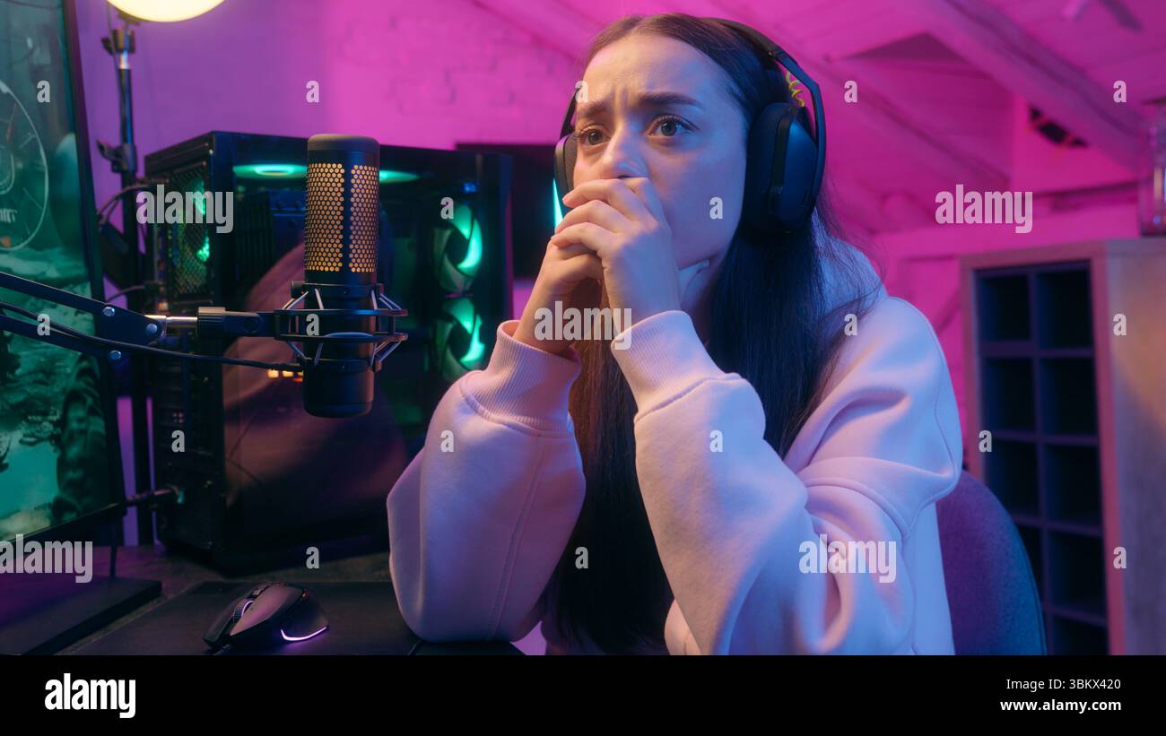 Frustrated sad woman gamer girl female streamer in headphones worry ...