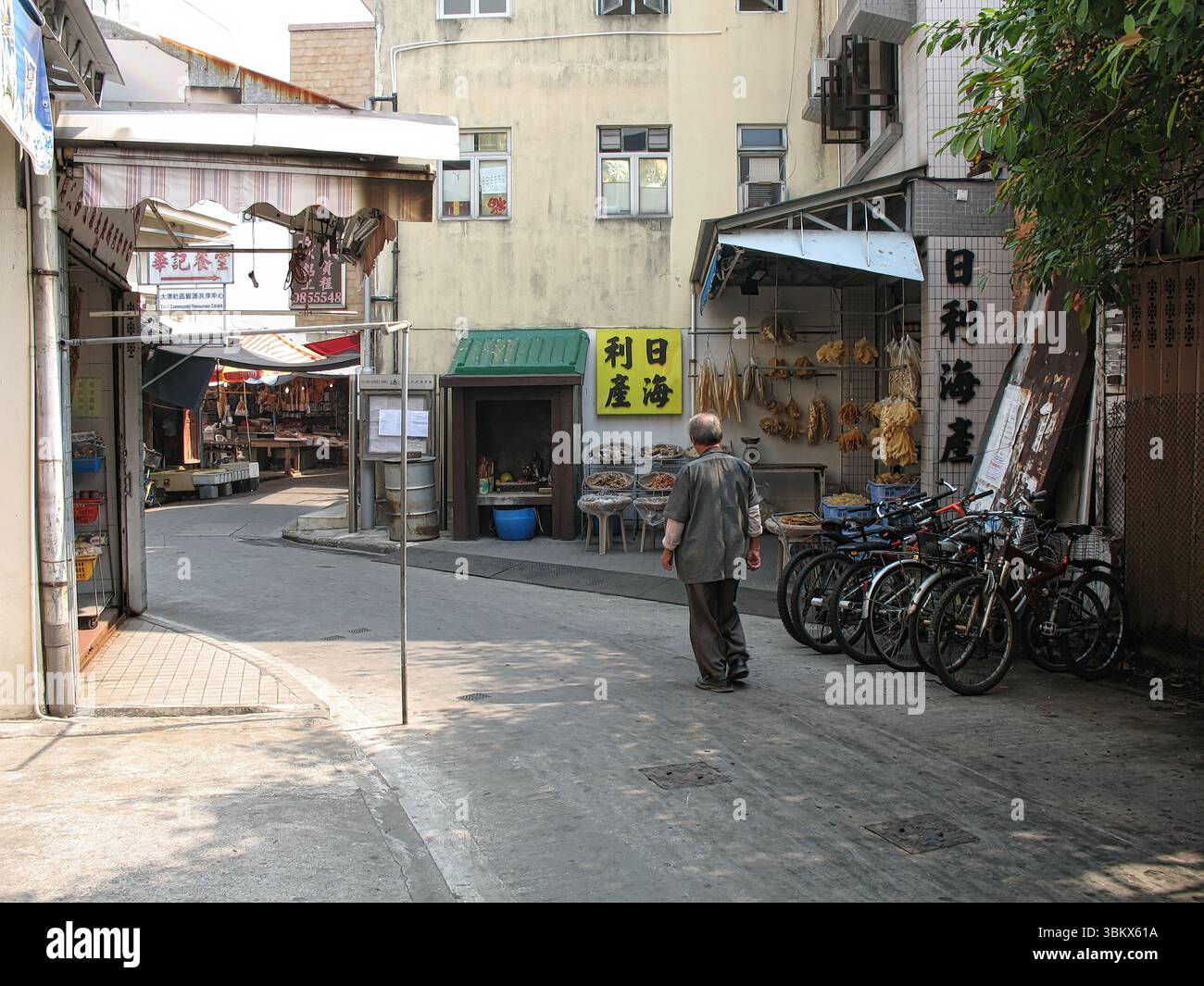 Man Walking Down the Street, Tai O Fishing Village, Hong Kong, China ...