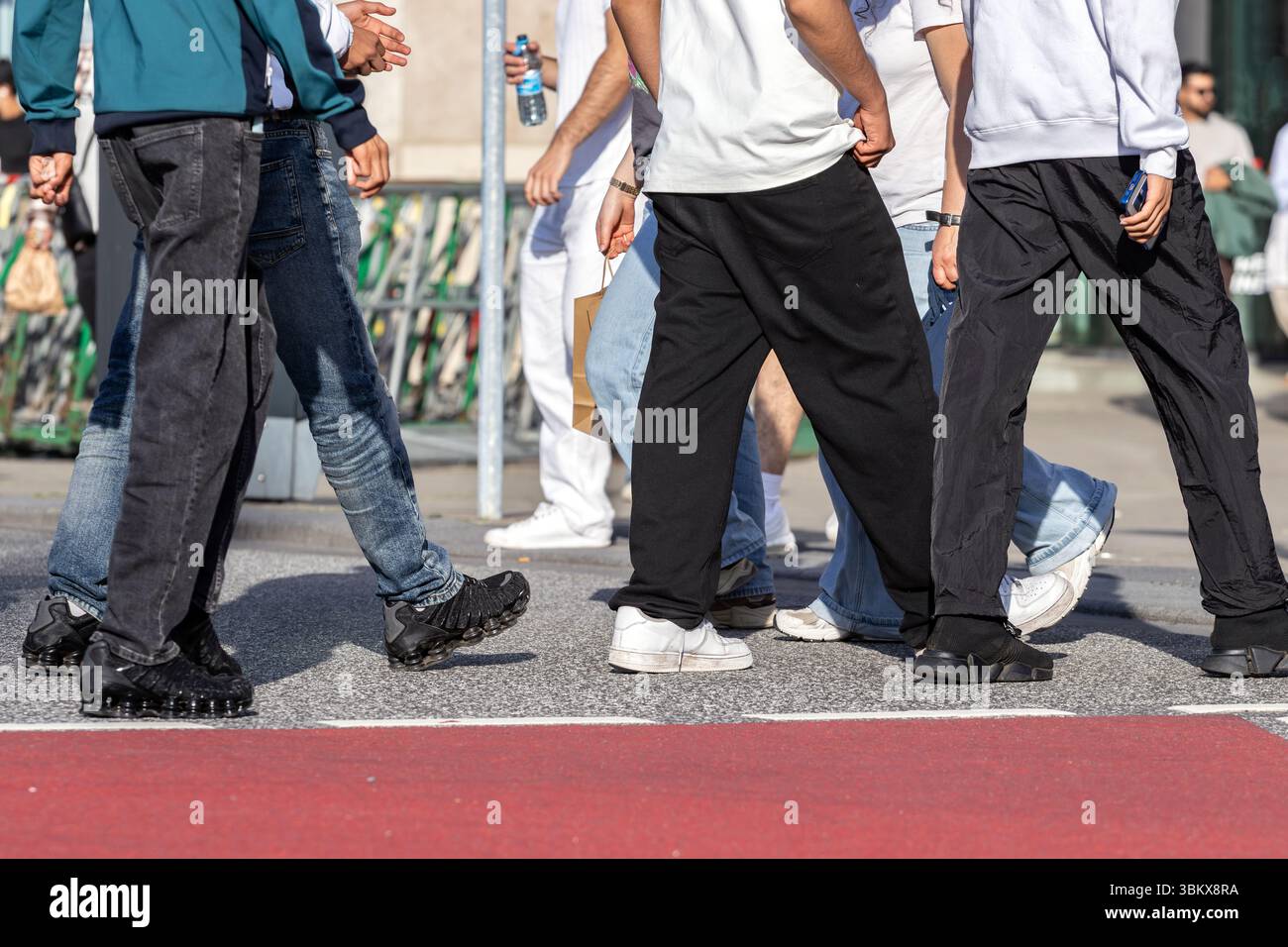 Group young men walk hi-res stock photography and images - Alamy