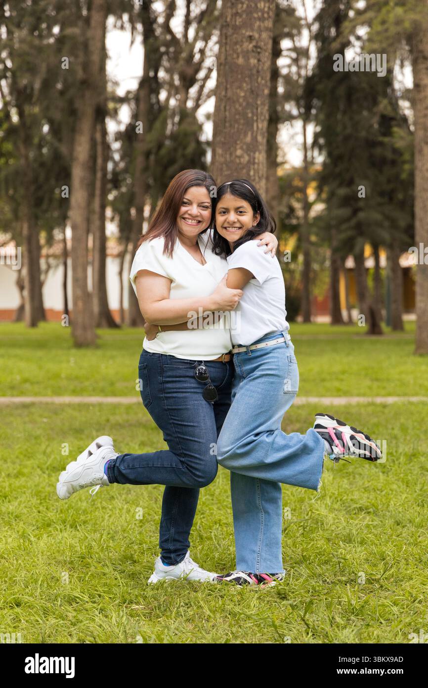Two women hug one hi-res stock photography and images - Alamy