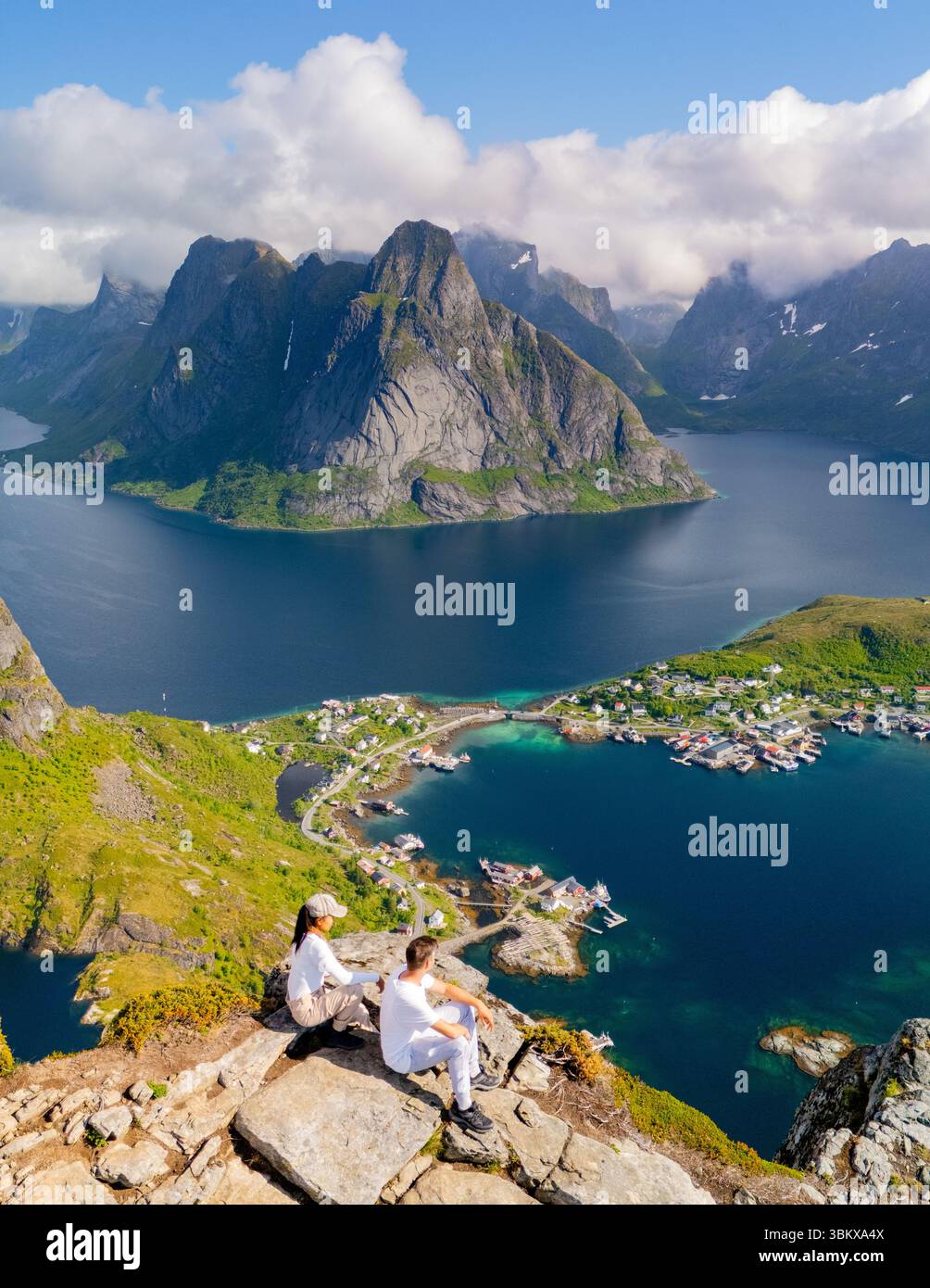 Majestic mountains and azure waters define the Lofoten Islands in ...