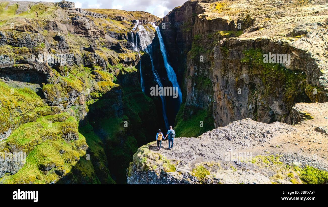 Experience breathtaking glymur waterfall cascading hi-res stock ...