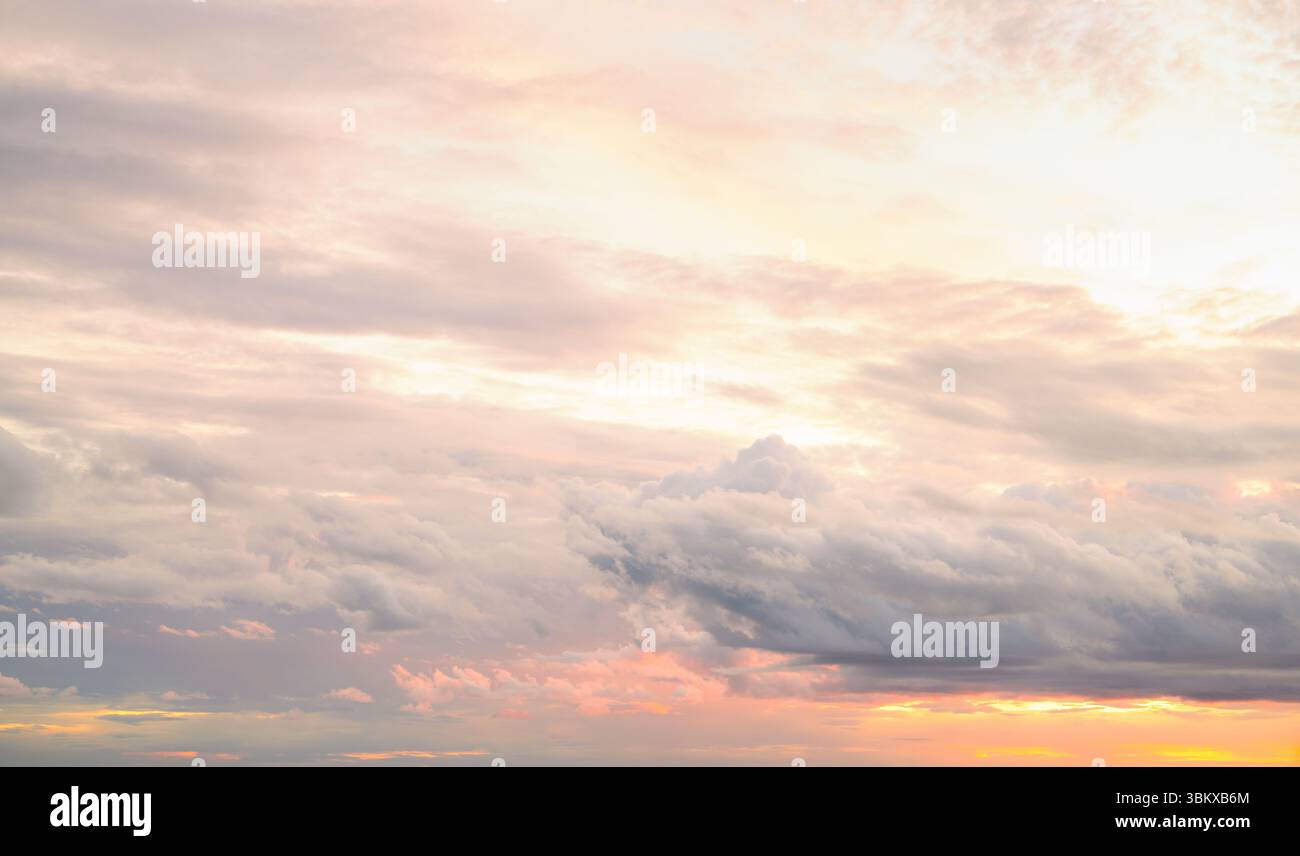 Dramatic overcast sky panorama with gray storm clouds during golden ...