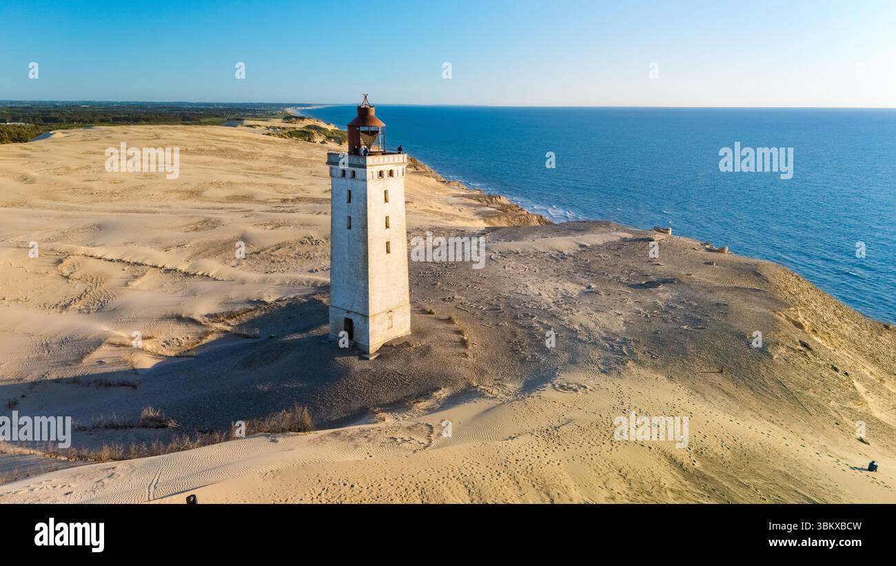 A stunning view of Rubjerg Knude lighthouse, standing tall on the ...