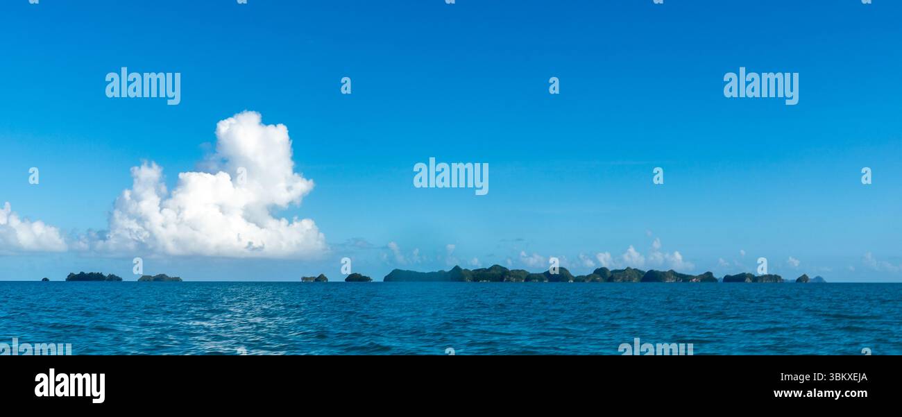 A serene seascape featuring a vast expanse of turquoise water under a ...