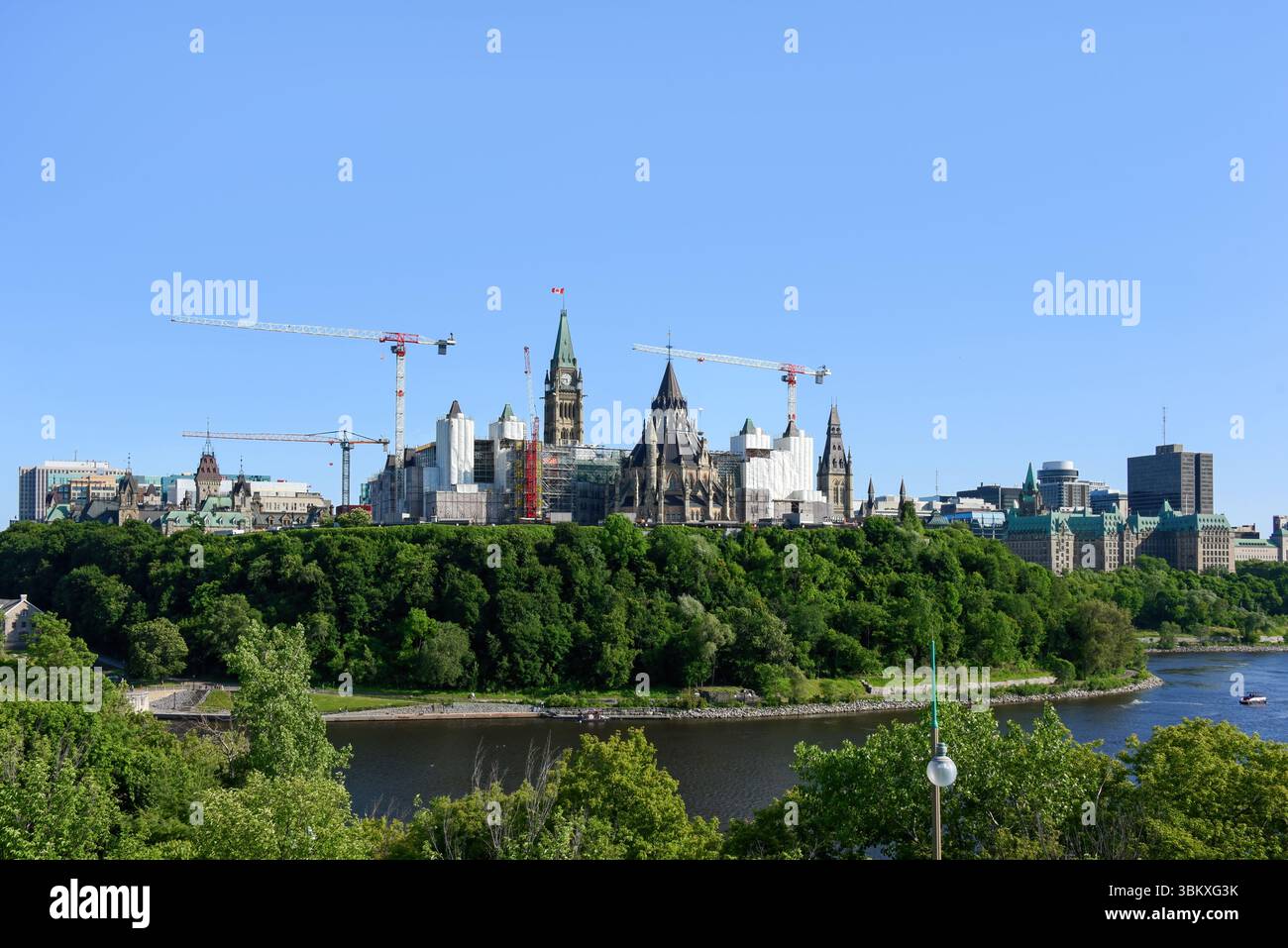 Ottawa skyline with Ottawa River and the Parliament Building under ...