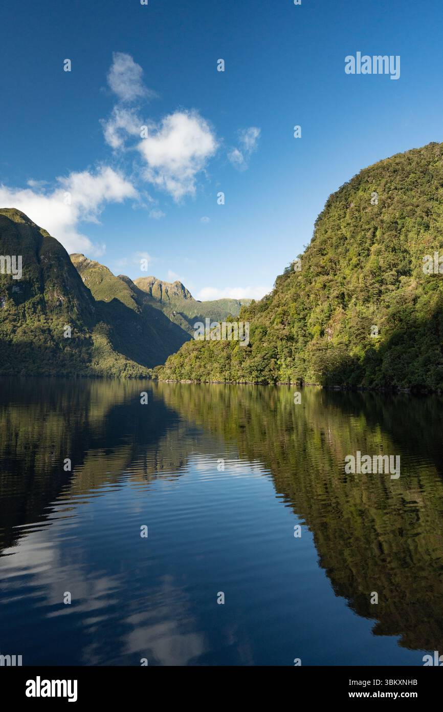 Calm water reflects stunning mountain hi-res stock photography and ...